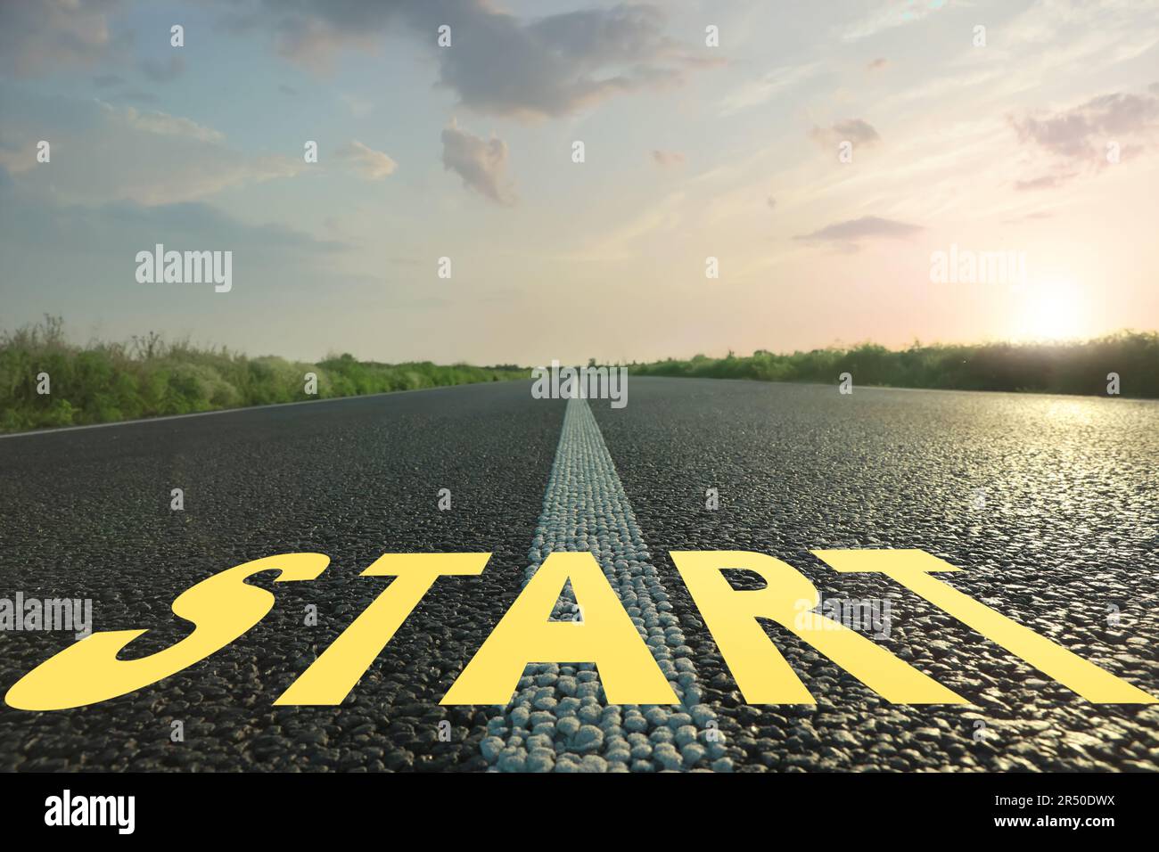 New beginnings. Word Start on asphalt road outdoors Stock Photo - Alamy