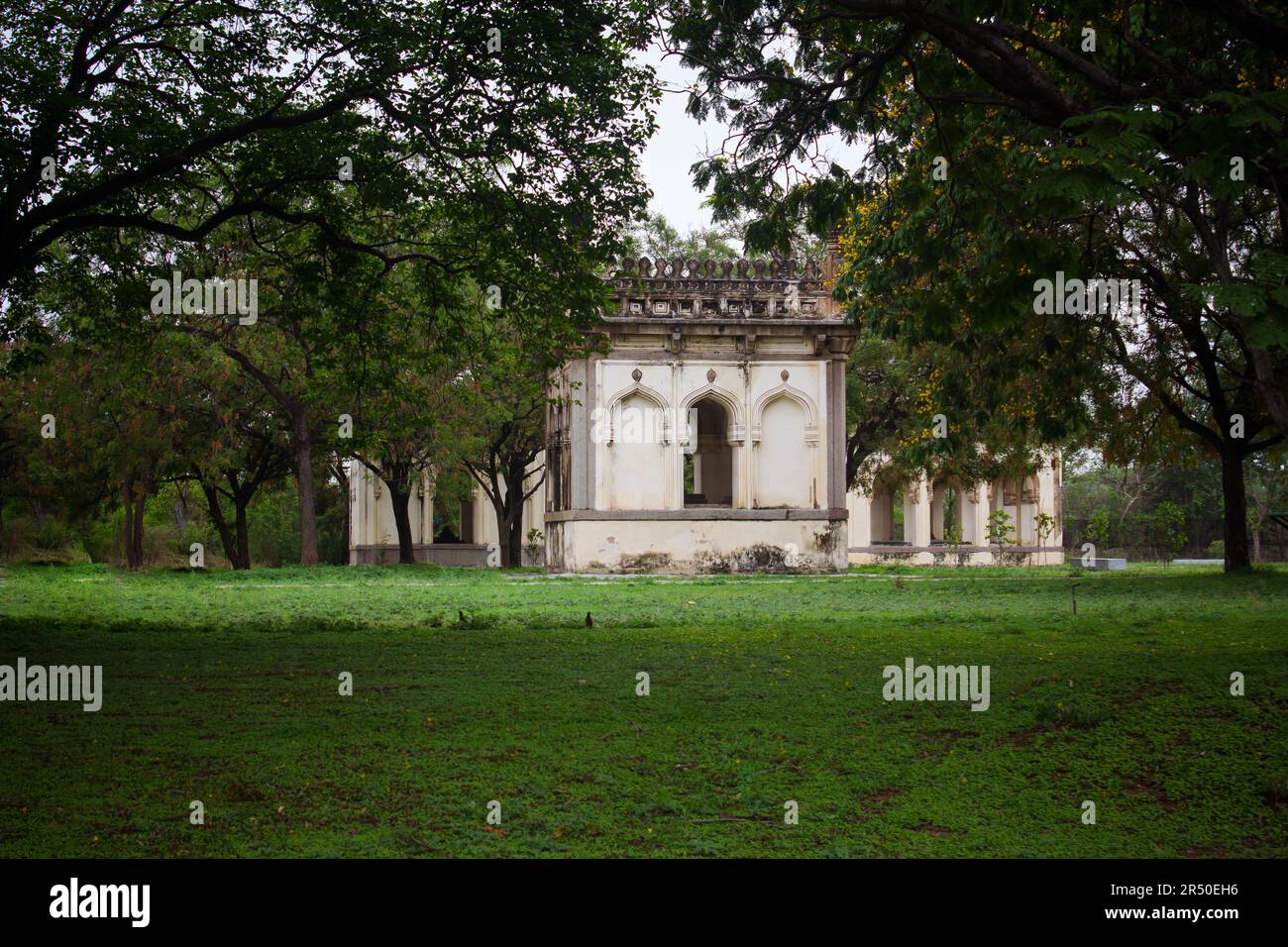 View of one of tomb building with natural surroundings in Qutb Shahi ...