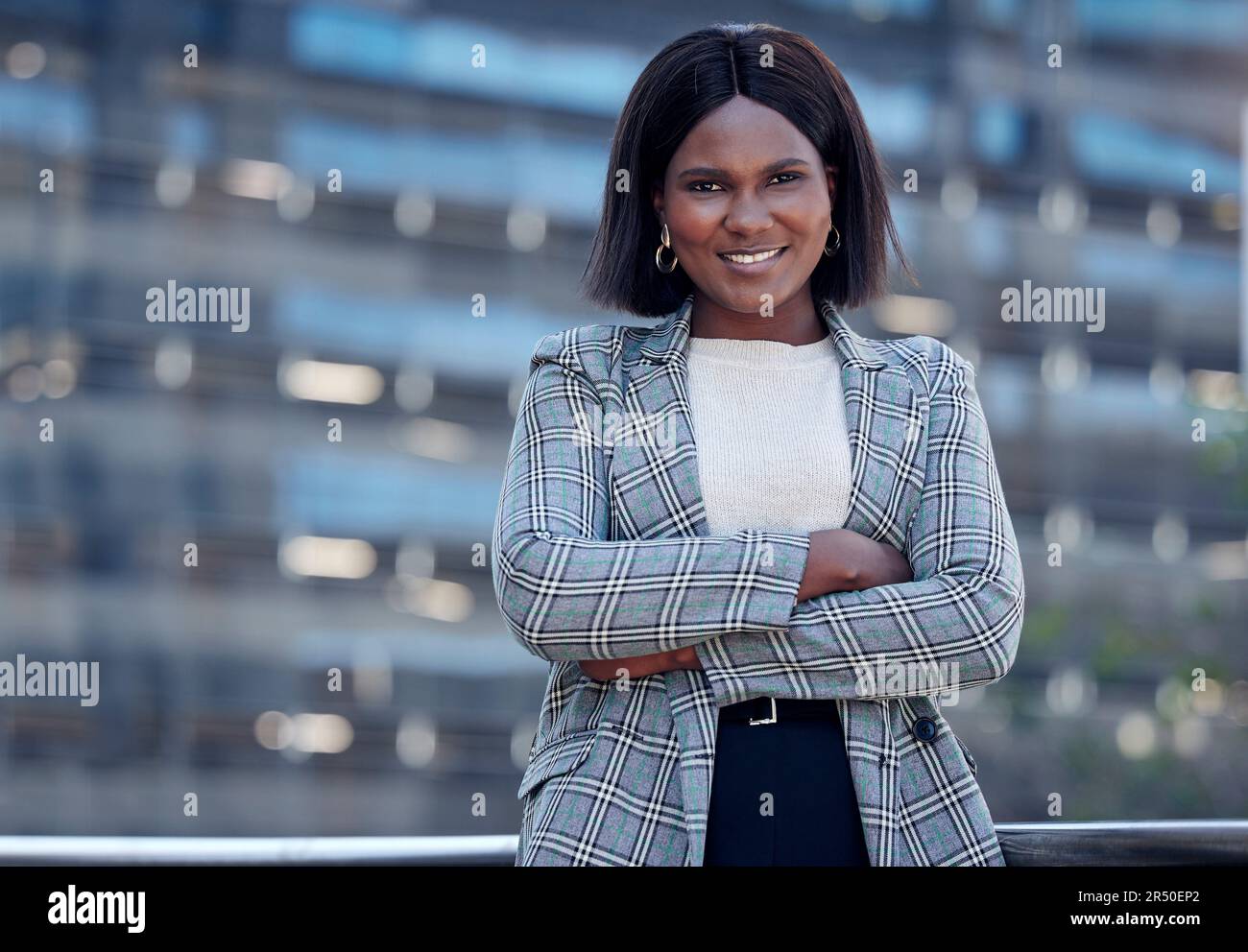 Attorney portrait, black woman and arms crossed in city for business ...