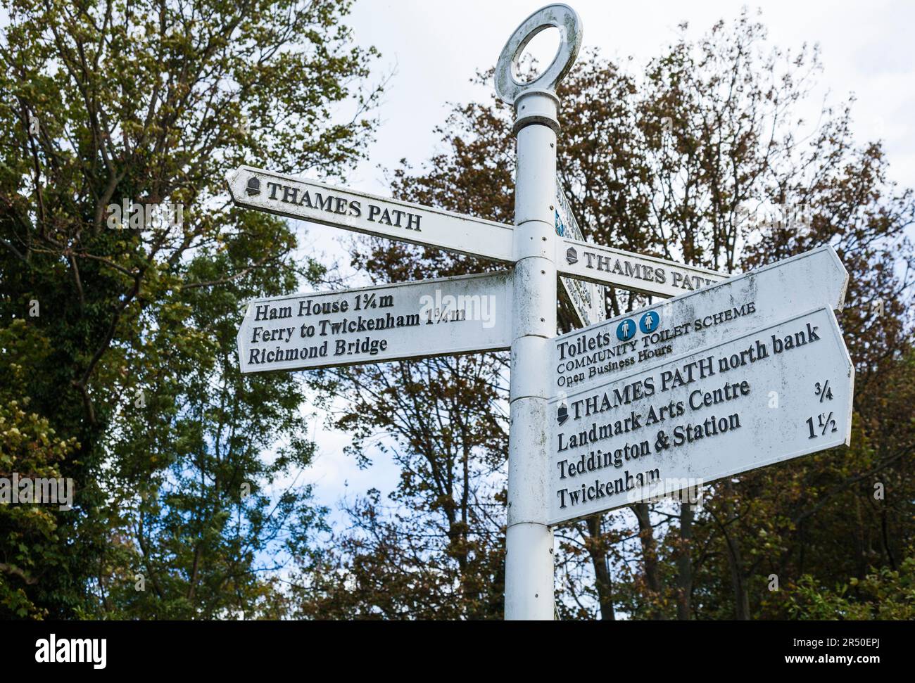 Signpost at Teddington near Teddington Lock,England,UK highlighting ...
