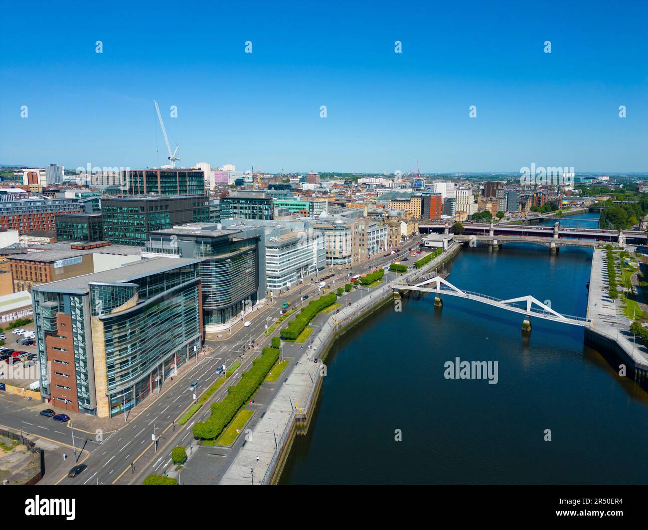 Aerial view from drone of Glasgow city centre skyline along River Clyde at IFSD , International ...