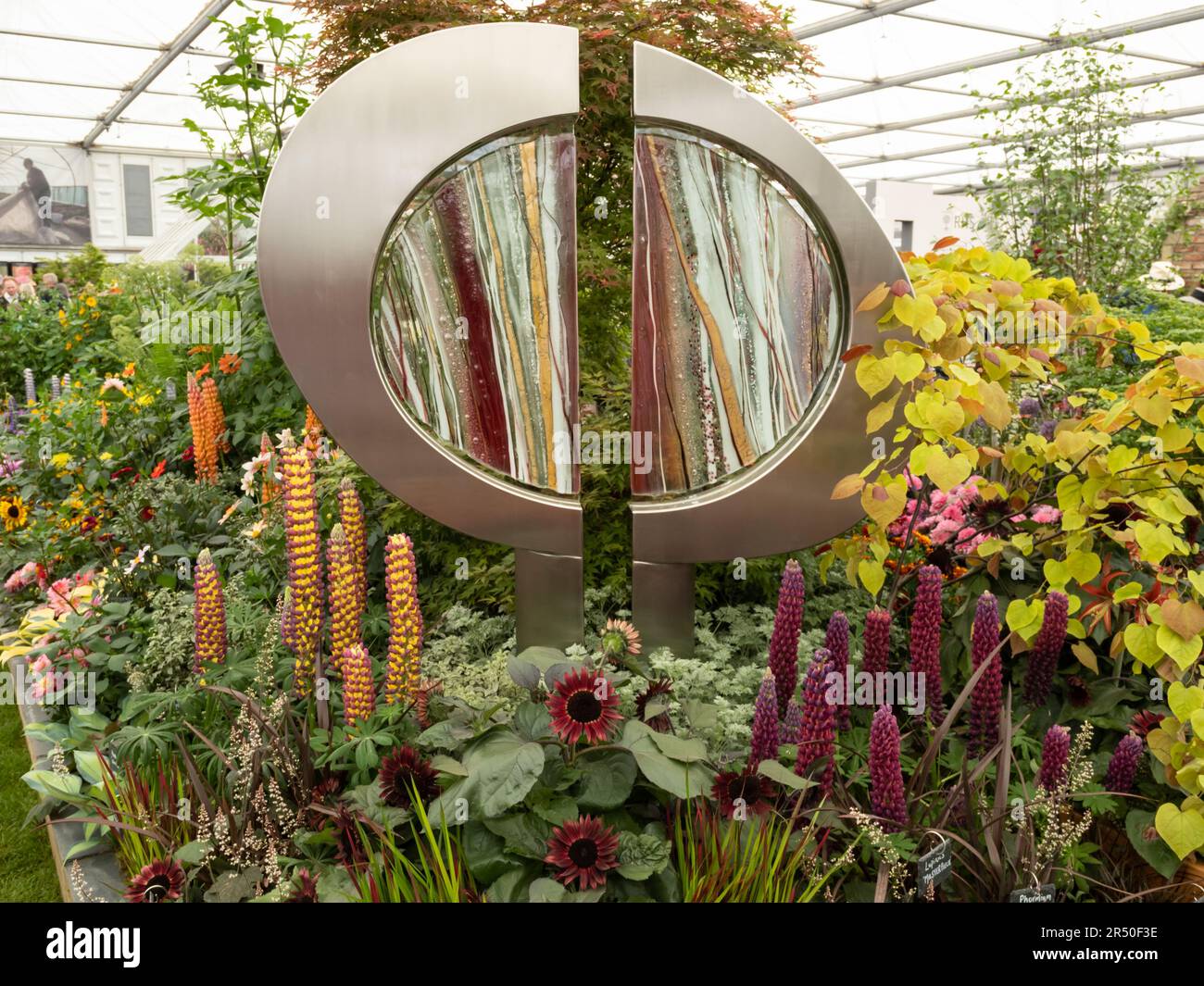 Garden displays inside the pavilion at Chelsea Flower Show 23 Stock ...
