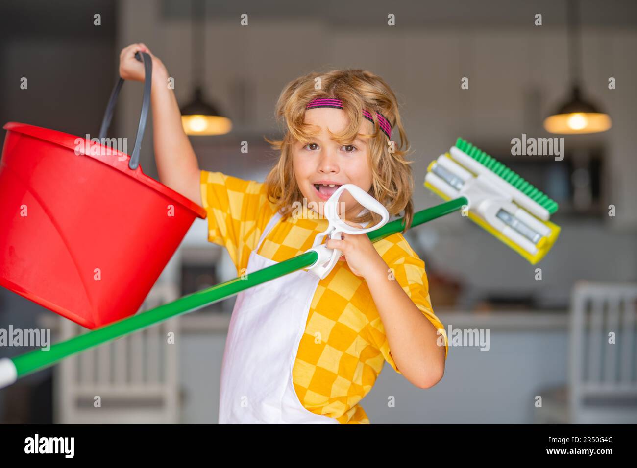 Children helping with housekeeping, cleaning the house. Housekeeping at ...