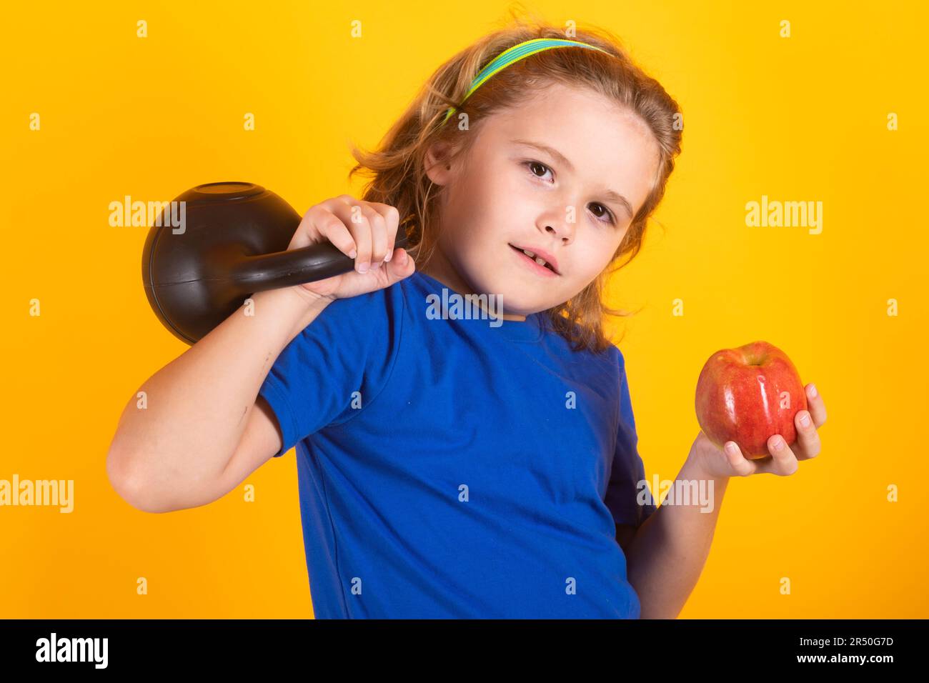Child boy working out with dumbbells. Kids sport and active healthy ...