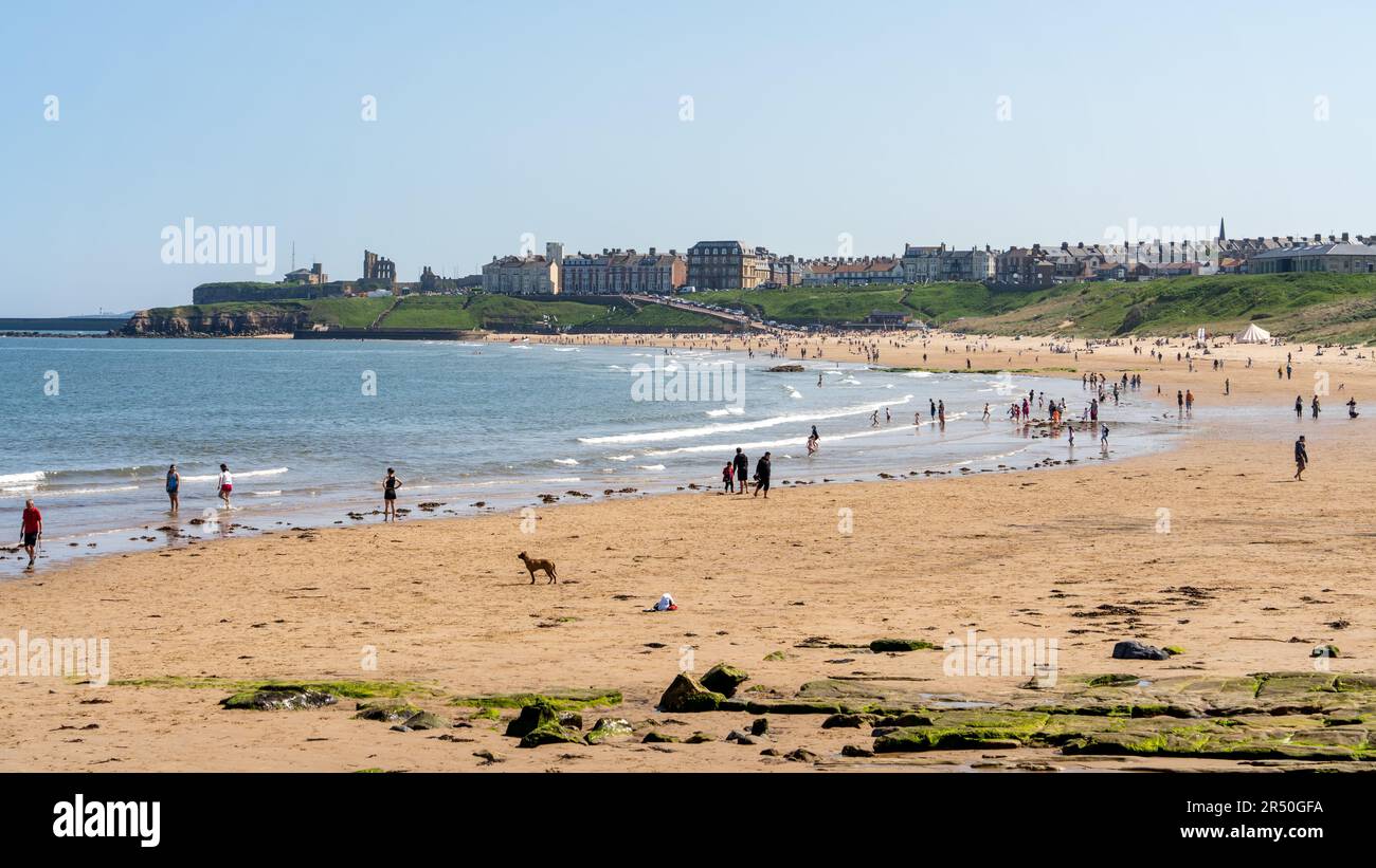 People enjoying the sunny weather on Longsands beach at the coast in ...
