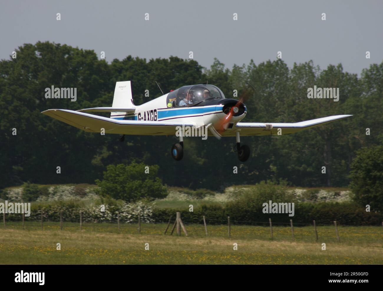 A Jodel D117 Grand Tourisme light aircraft departing Headcorn Aerodrome ...