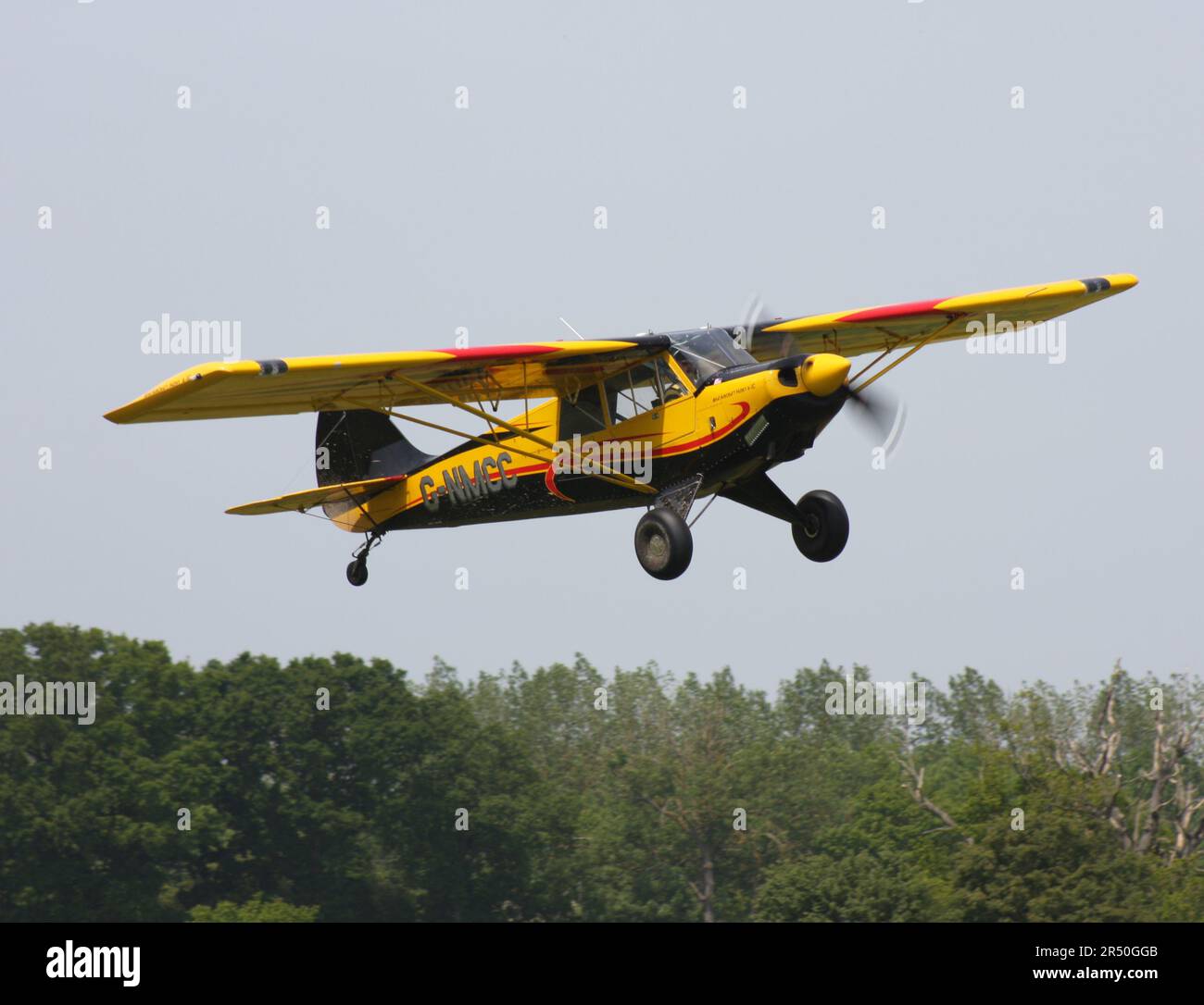 An Aviat A-1C Husky light aircraft departing Headcorn Aerodrome Kent ...