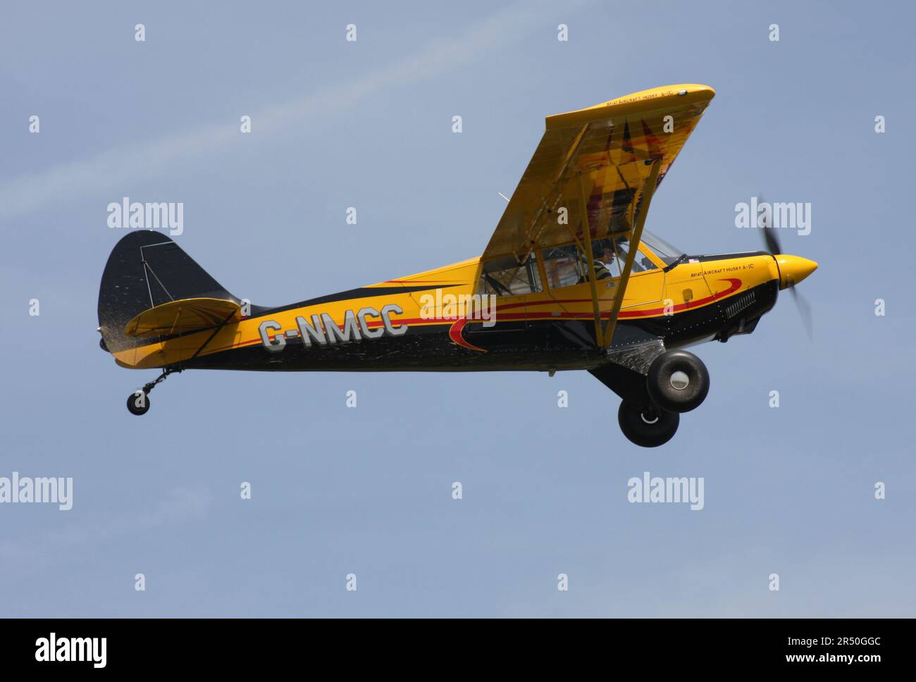 An Aviat A-1C Husky light aircraft departing Headcorn Aerodrome Kent ...