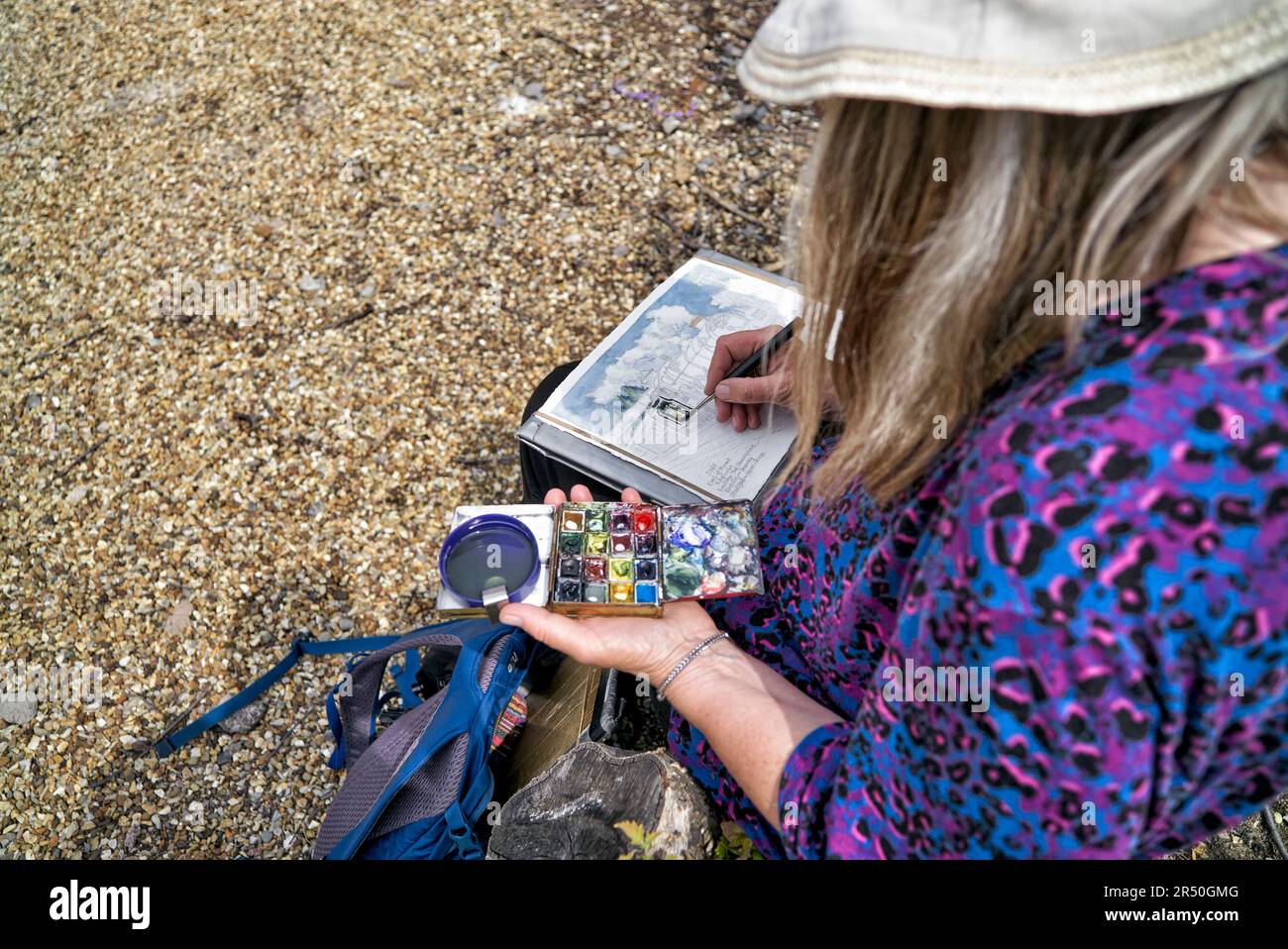 Female artist painting Steam train, view from above, England, UK Stock ... Female artist painting Steam train, view from above, England, UK Stock ...