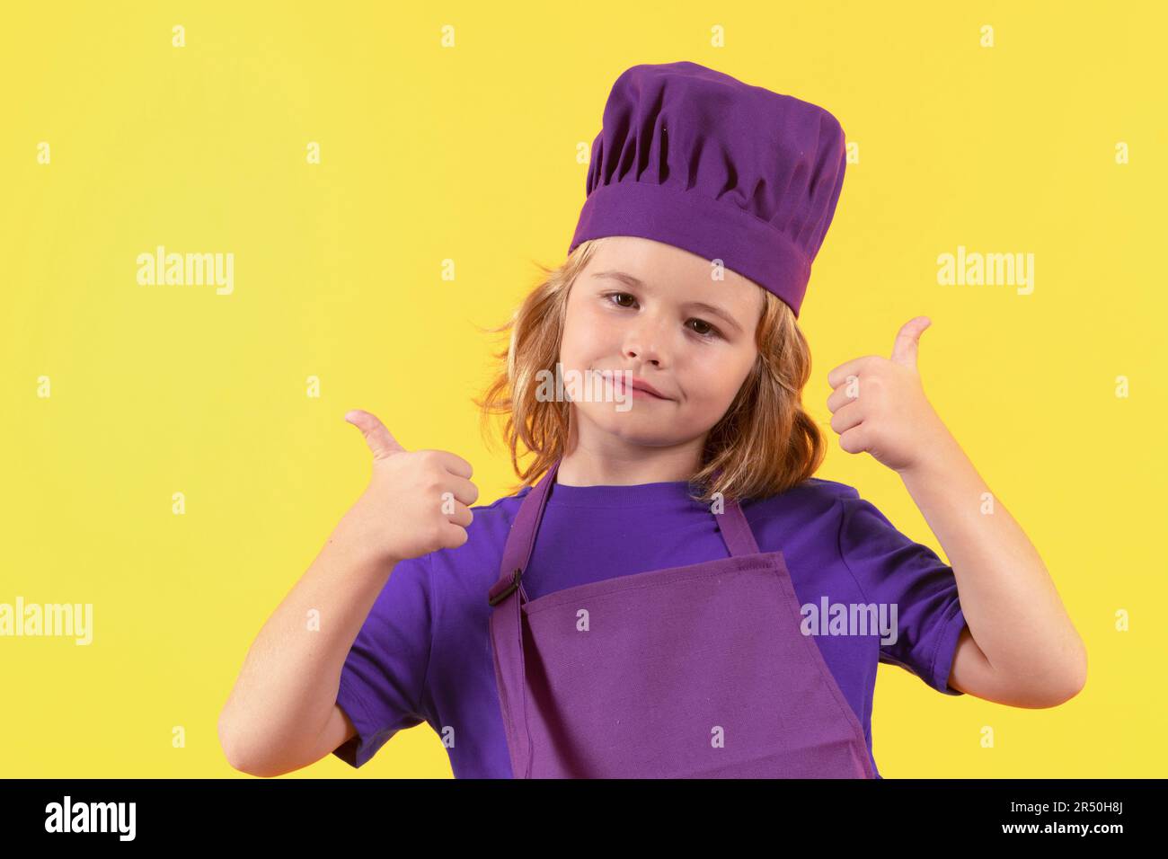 Funny kid chef cook studio portrait. Child chef cook, studio portrait ...