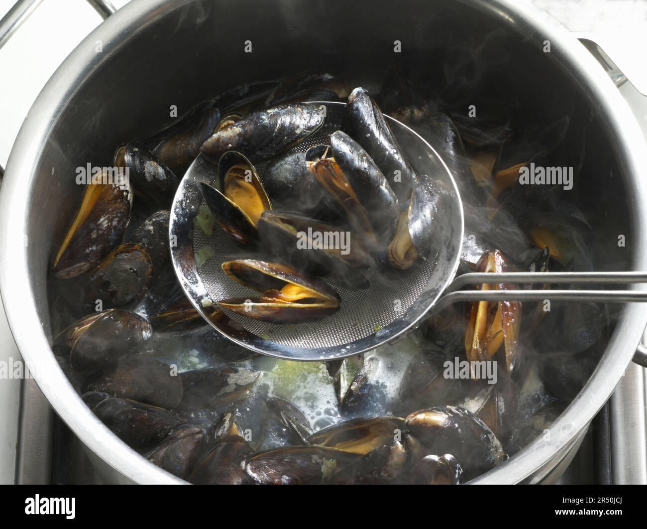 Lifting water pot hi-res stock photography and images - Alamy