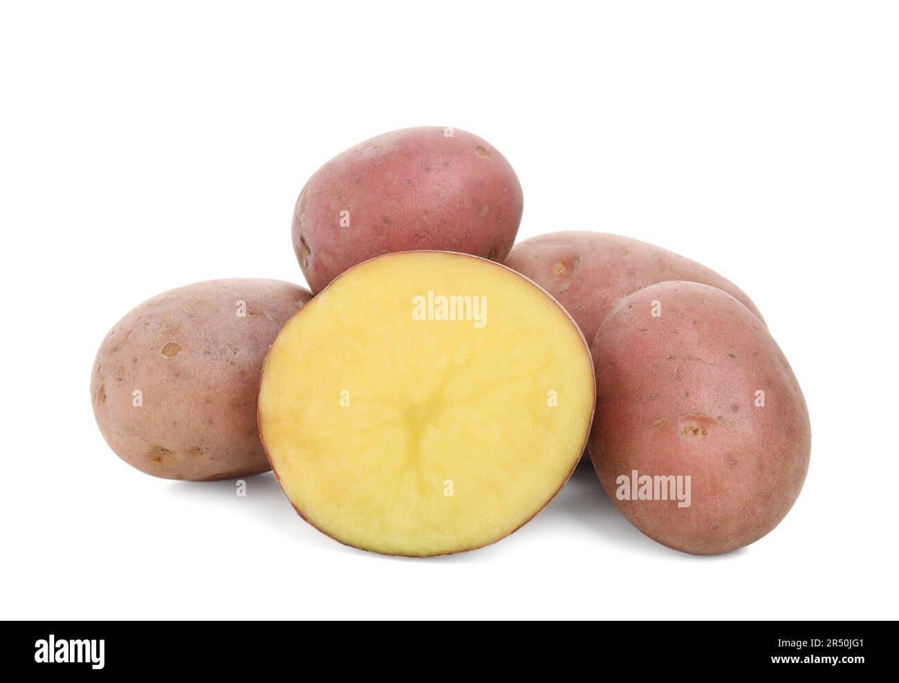 Whole and cut fresh potatoes on white background Stock Photo - Alamy
