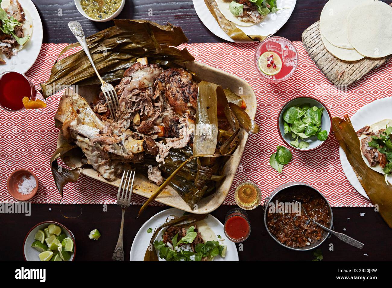 Slow roasted Mexican lamb in banana leaves Stock Photo - Alamy