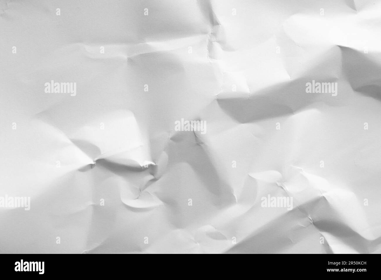 Crumpled sheet of paper as background, closeup Stock Photo - Alamy