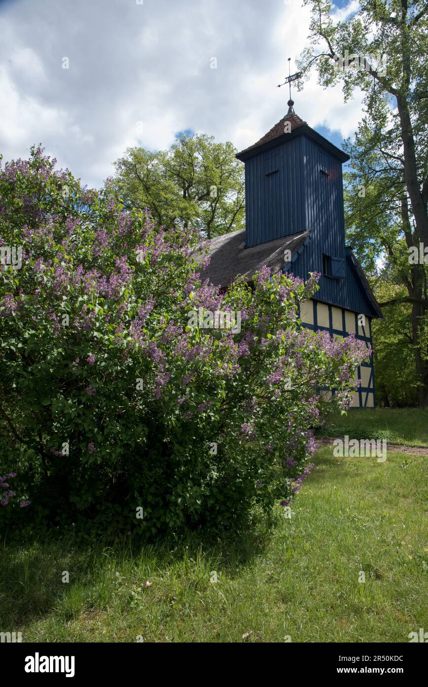 small church in the green is a tiny timber framed and restored church ...