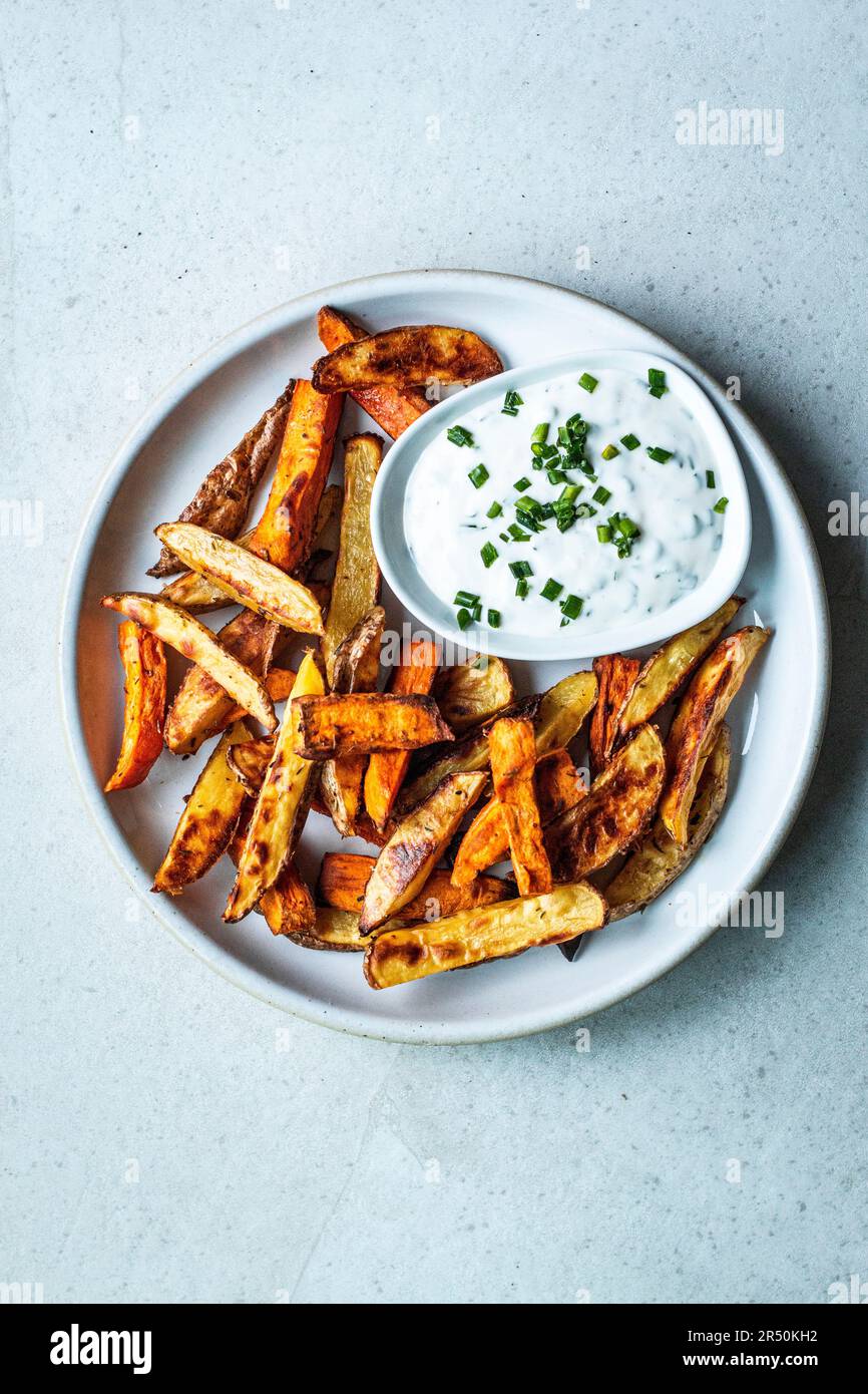 Homemade colorful fries with tartar sauce Stock Photo - Alamy