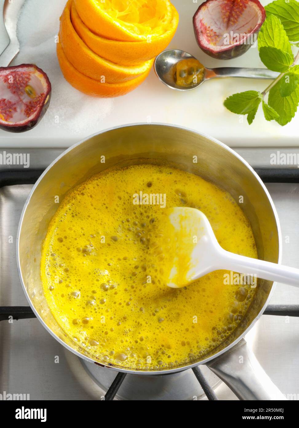 Making fruit sauce Stock Photo - Alamy