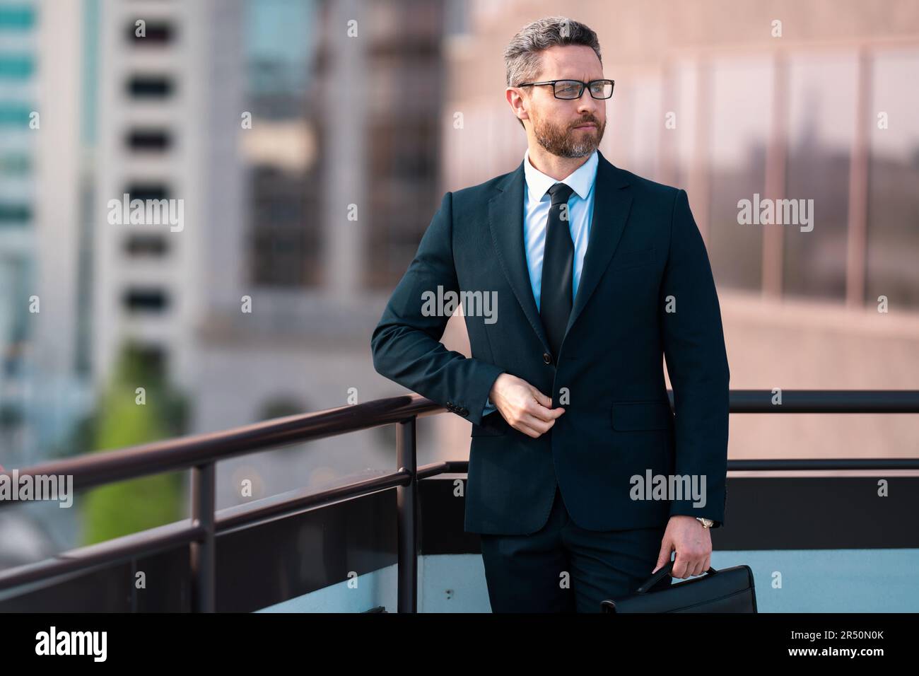 Business success, financial strategy. Businessman in front of office ...