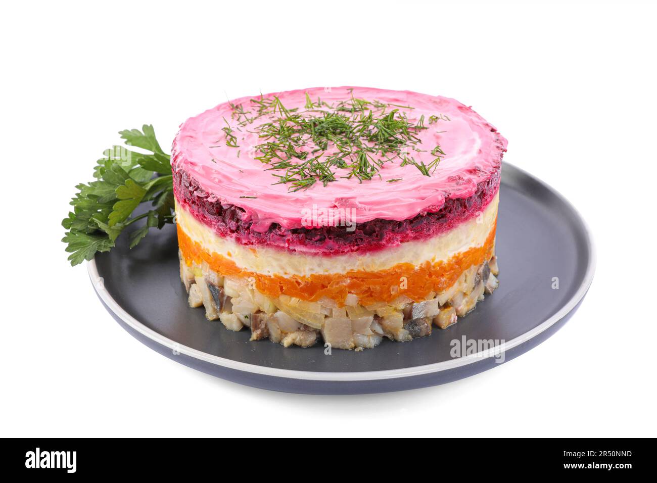 Herring under fur coat salad isolated on white. Traditional Russian ...