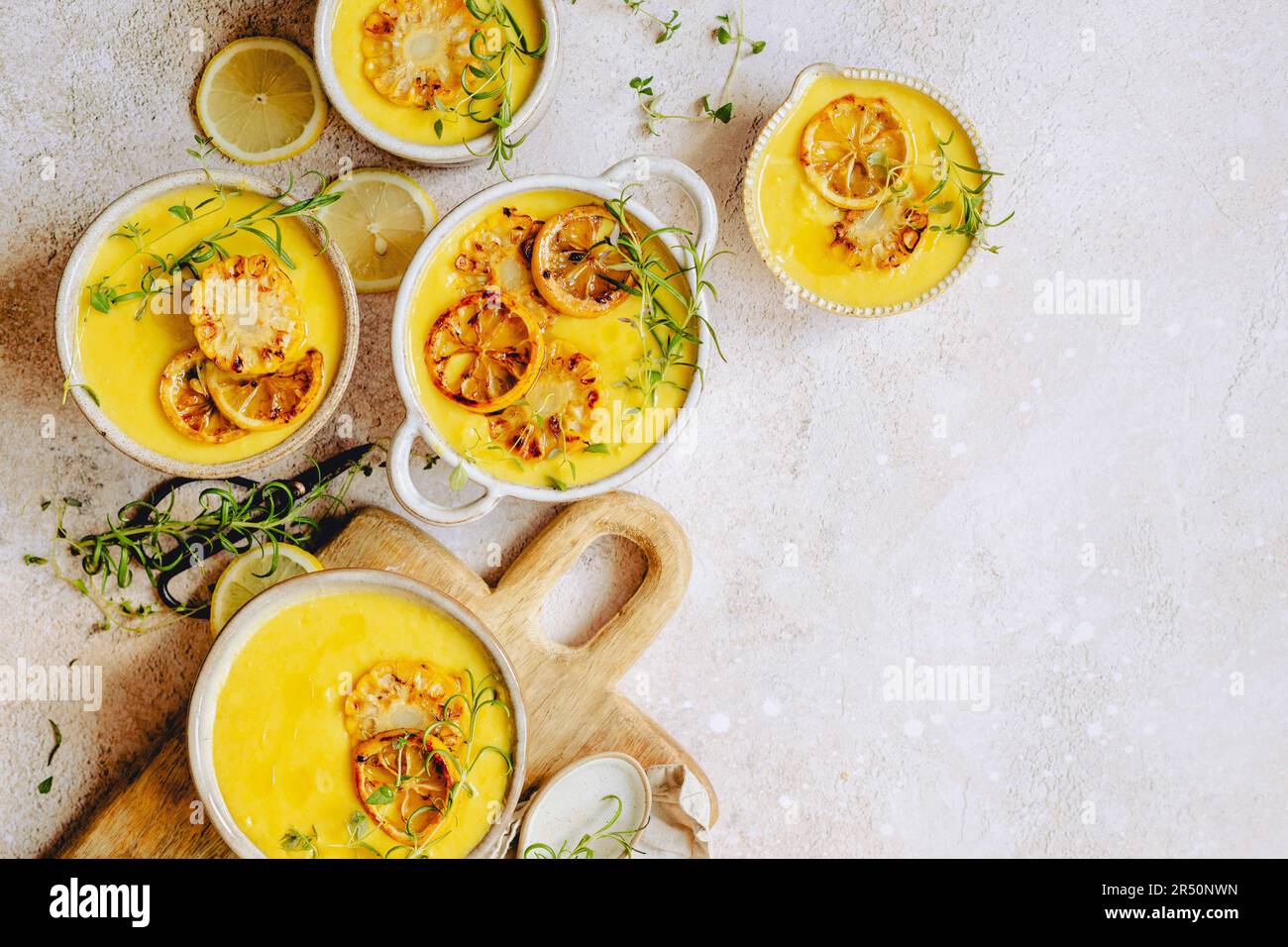 Sweet corn soup with lemon slices Stock Photo - Alamy