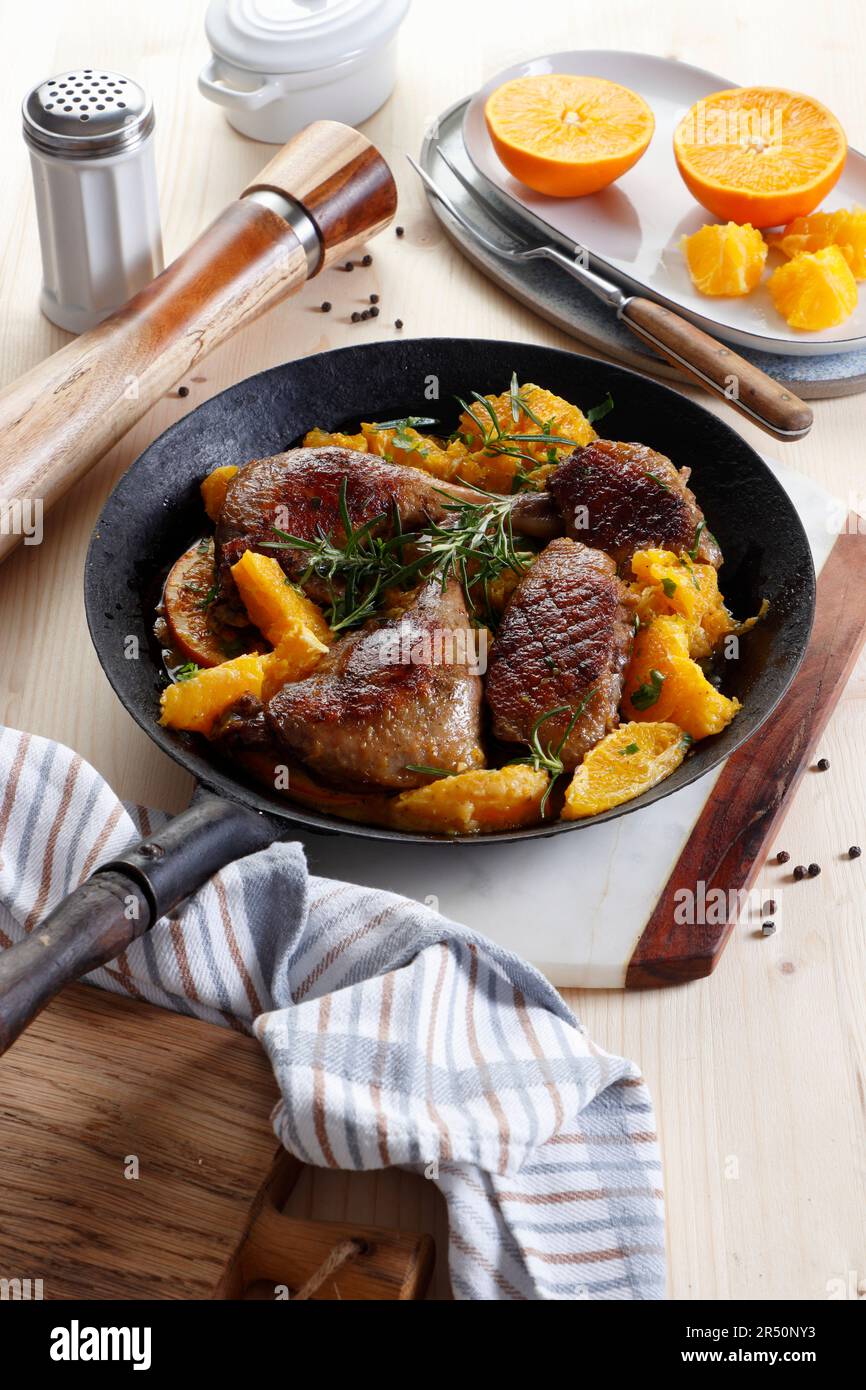 Pan roasted duck with oranges and rosemary Stock Photo - Alamy