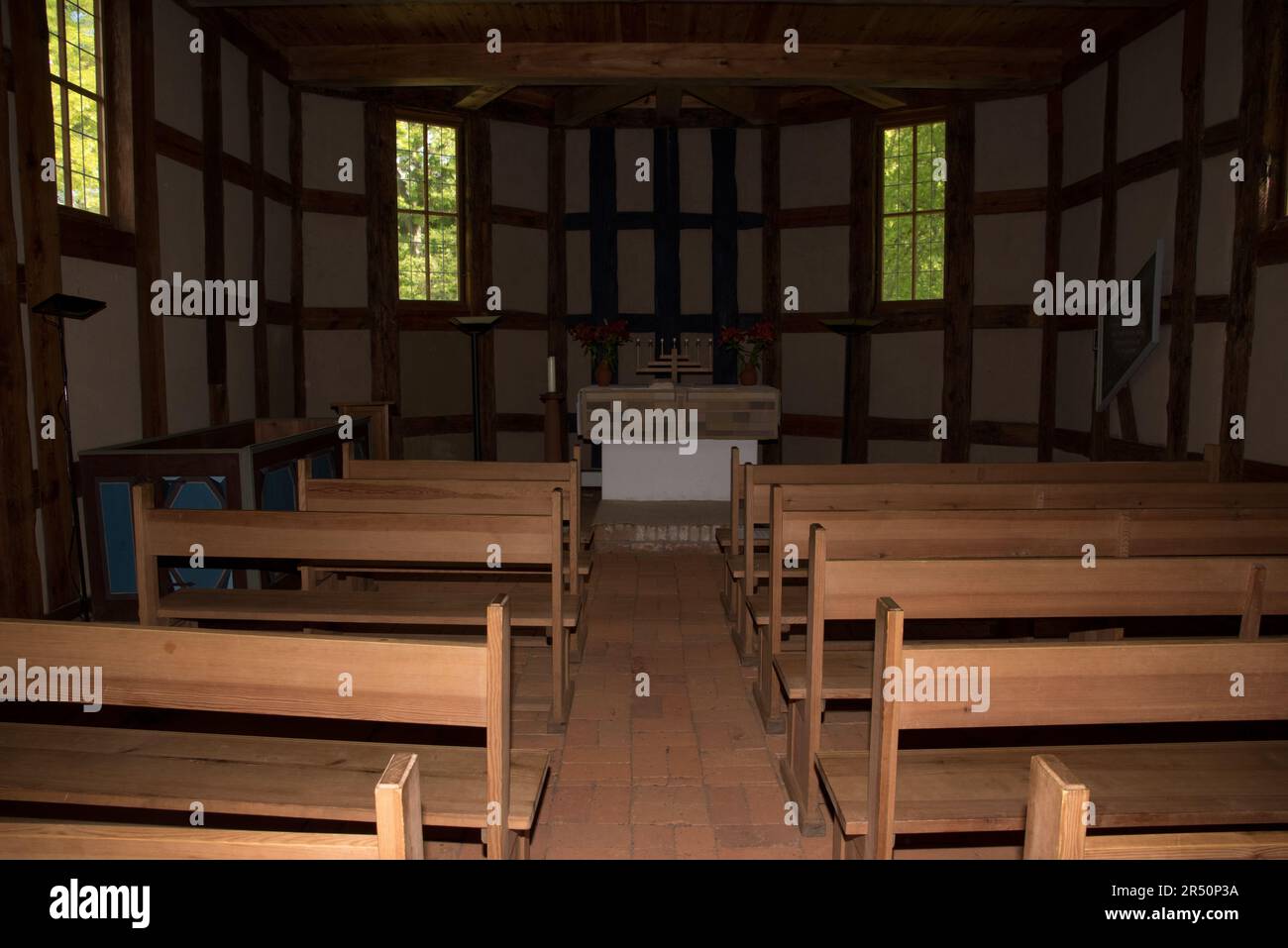 small church in the green is a tiny timber framed and restored church ...