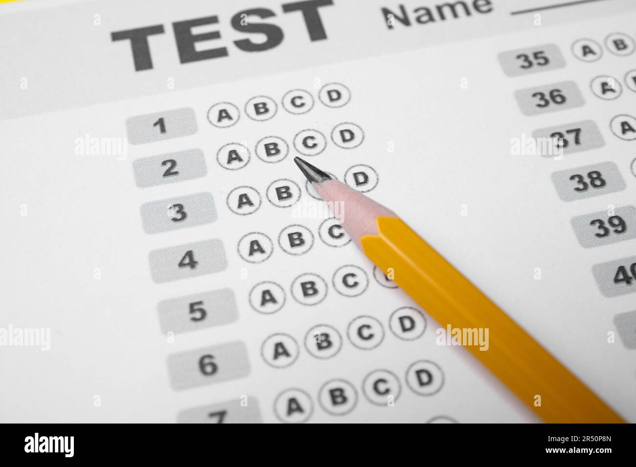 Pencil on answer sheet, closeup. Student passing exam Stock Photo - Alamy