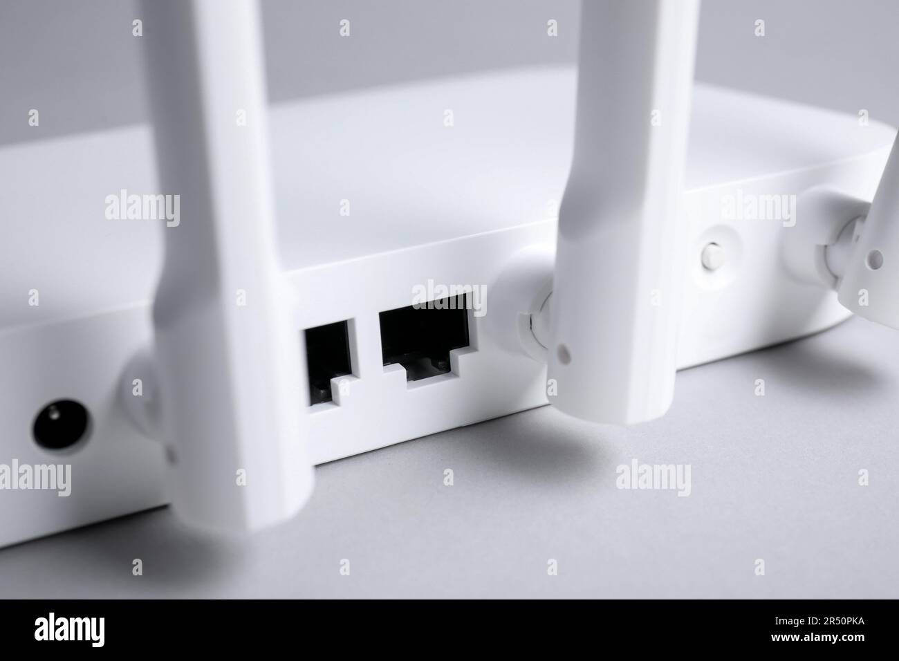 Wi-Fi router on light grey background, closeup Stock Photo - Alamy