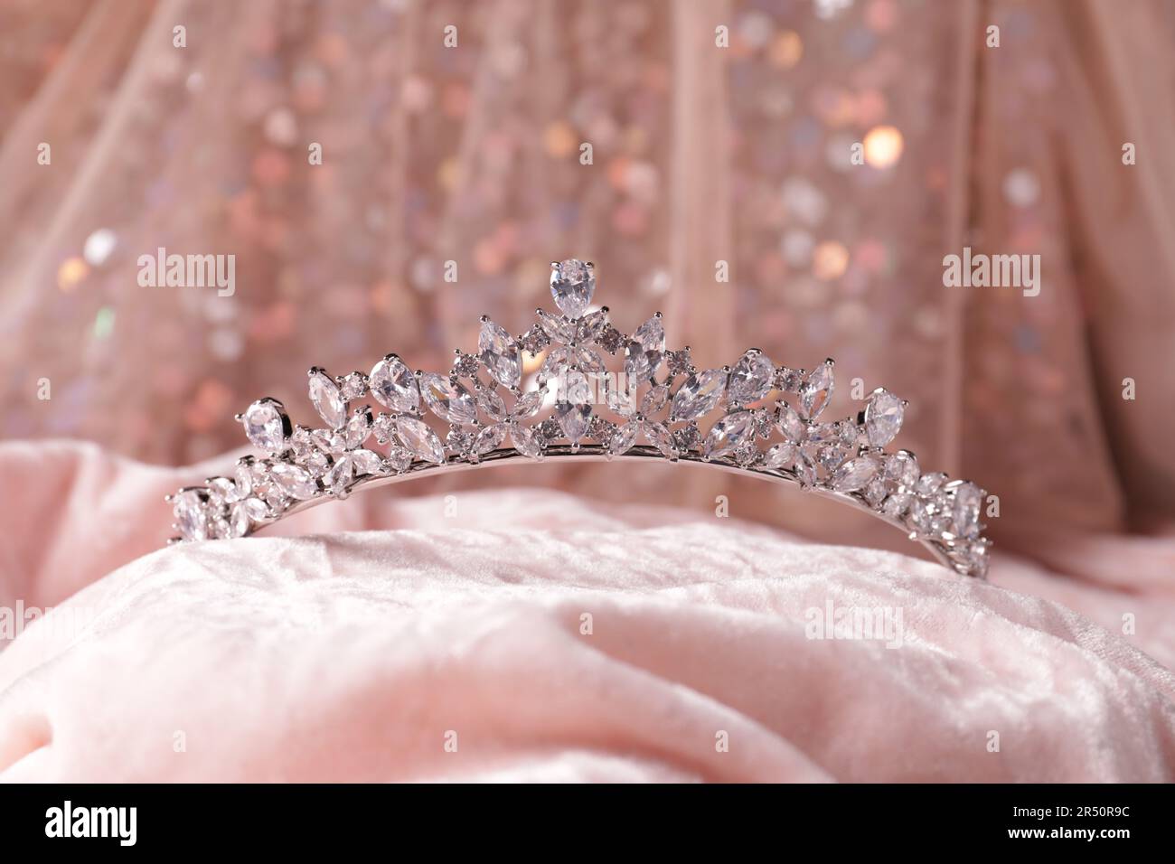 Beautiful silver tiara with diamonds on pink cloth Stock Photo - Alamy