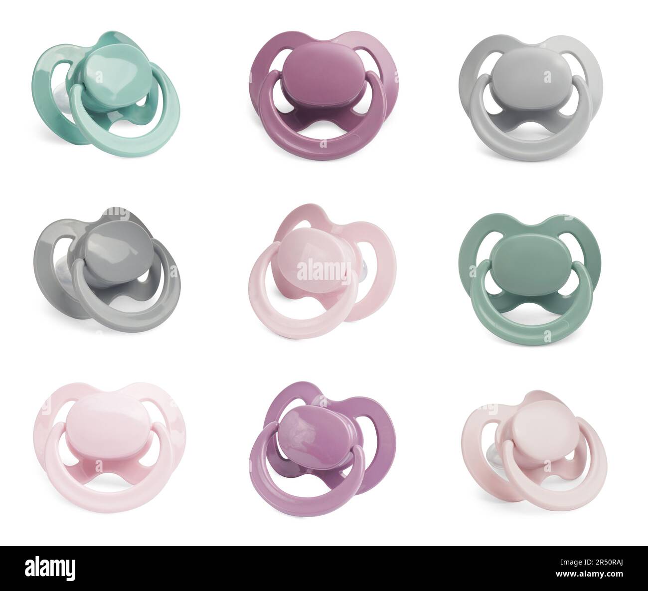 Collage of baby pacifiers in different colors on white background Stock ...