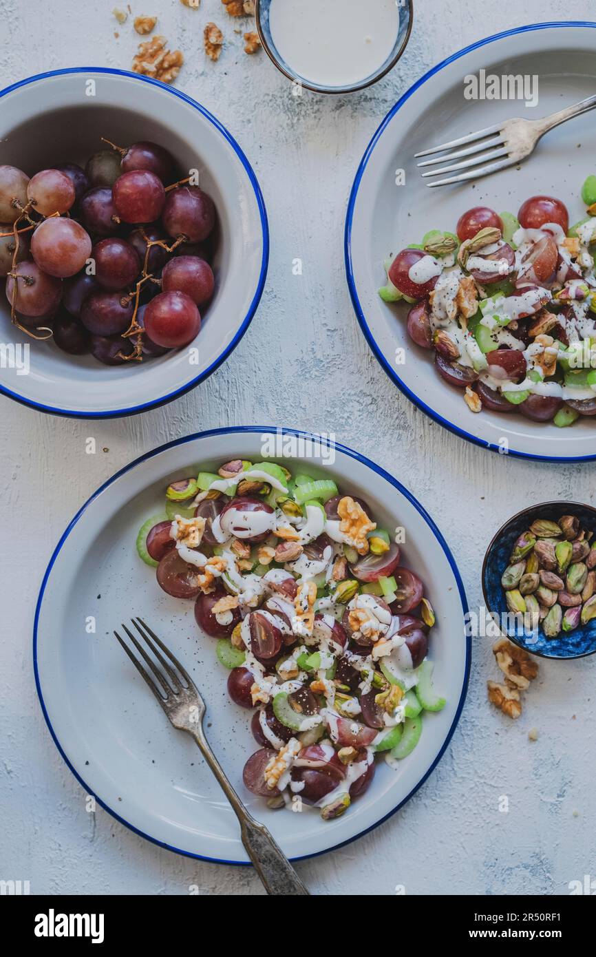 Salad with grapes, celery, walnuts and mayonnaise sauce Stock Photo - Alamy