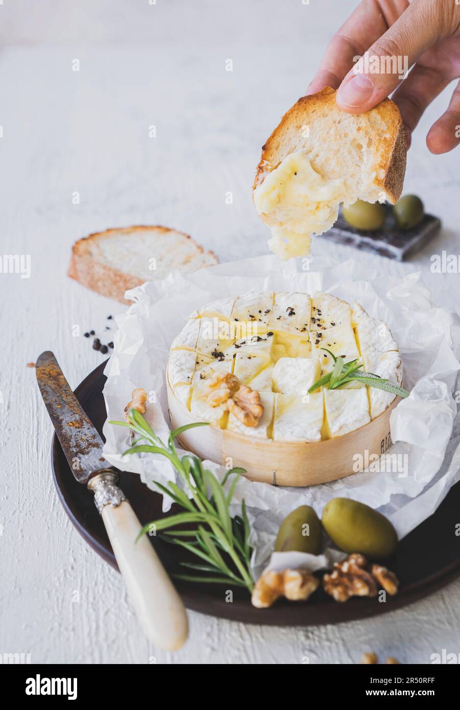 Baked camembert with bread Stock Photo - Alamy