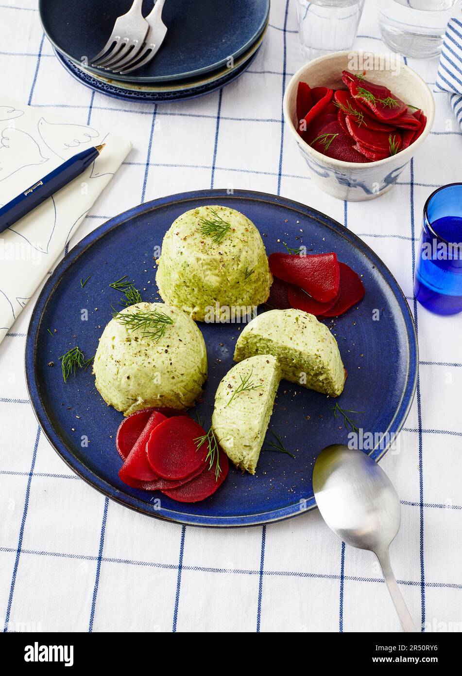 Zucchini flan with beet salad Stock Photo - Alamy