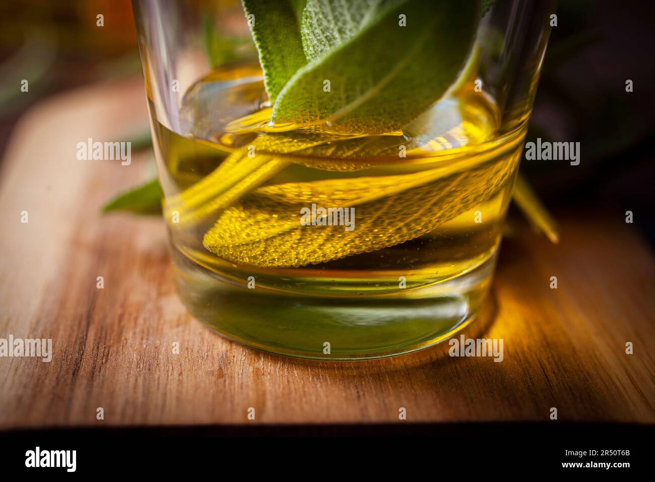 Fresh sage leaves in olive oil Stock Photo - Alamy