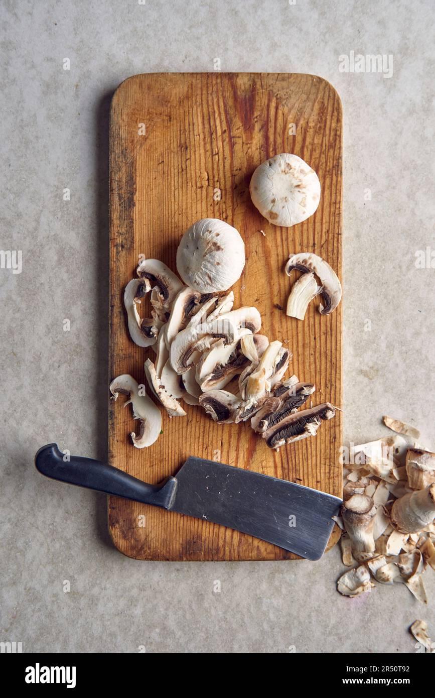 Sliced fresh champignon mushrooms being hi-res stock photography and ...