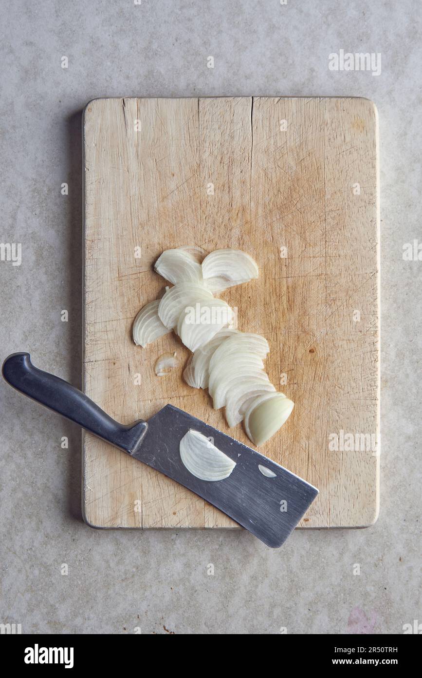 Onion cut into half moon slices Stock Photo - Alamy
