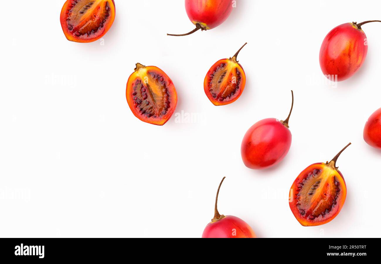 Whole and halved tamarillo Stock Photo - Alamy