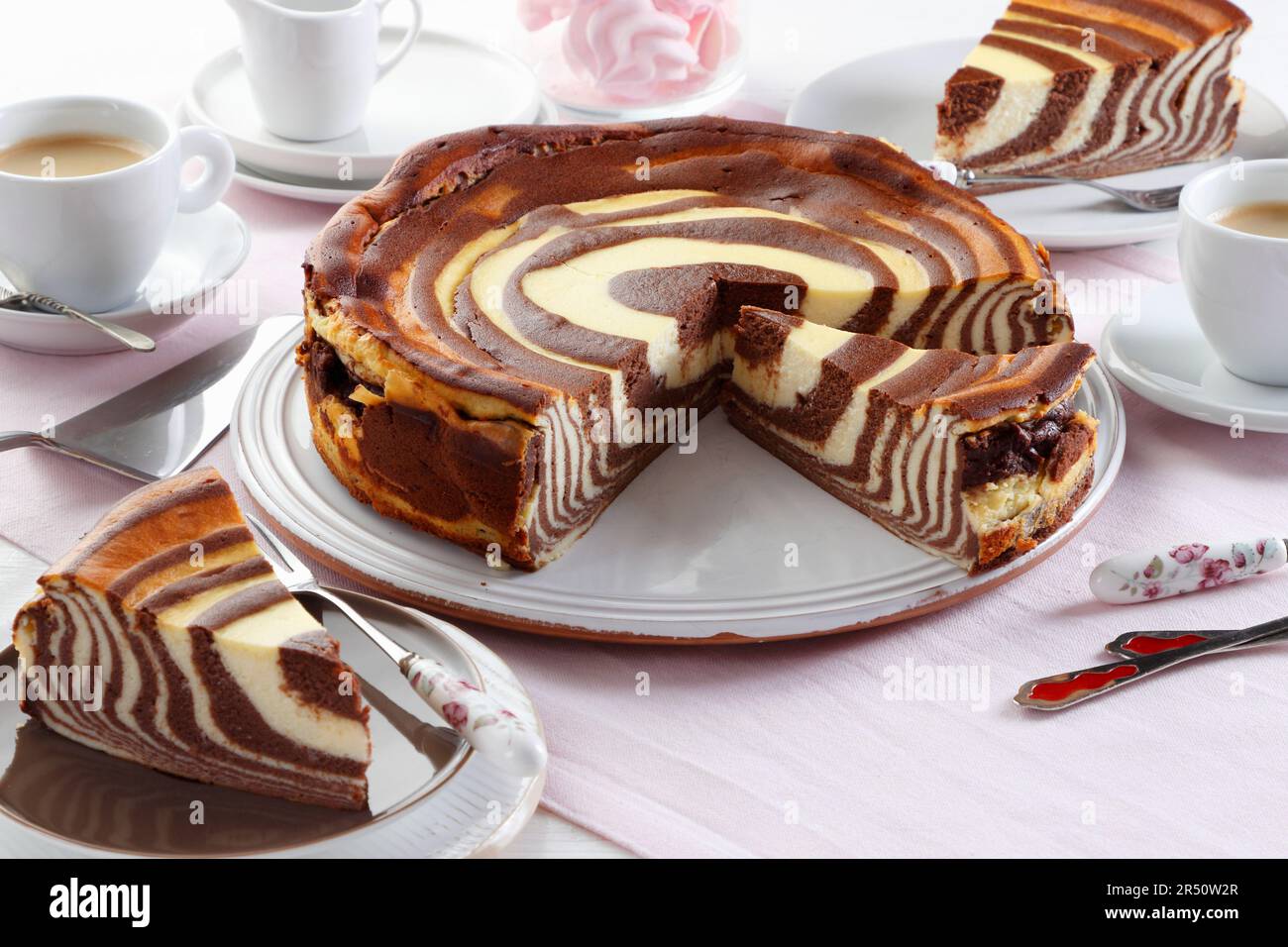 Chocolate zebra cheesecake, sliced Stock Photo - Alamy