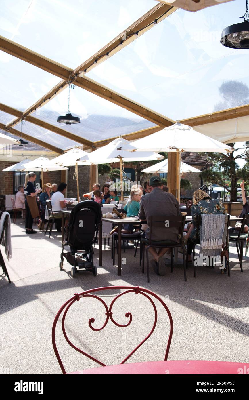 Families enjoying a coffee in the Roth Bar & Grill at the Hauser ...