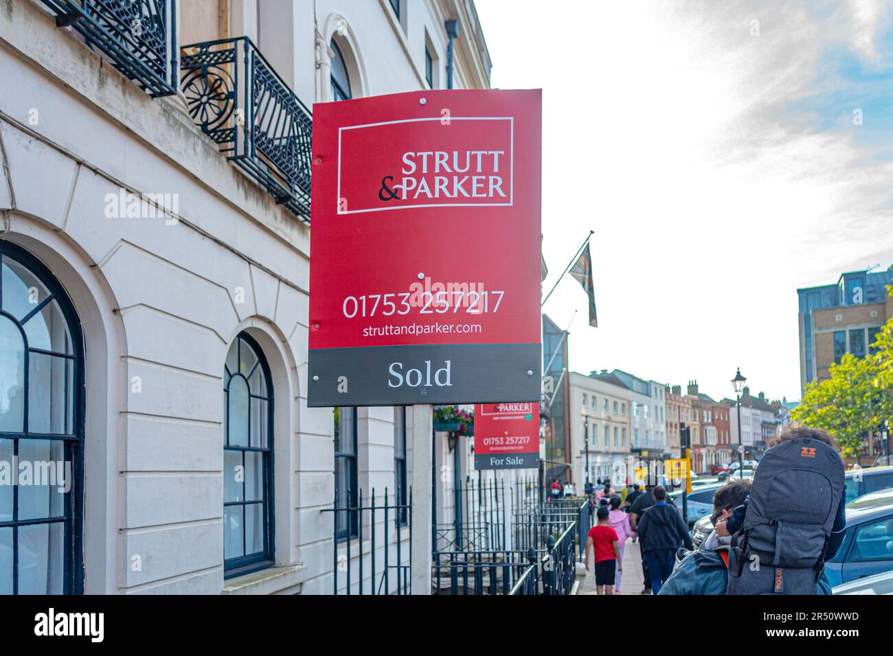 Estate Agents signs outside properties in Windsor, UK, one of which is ...