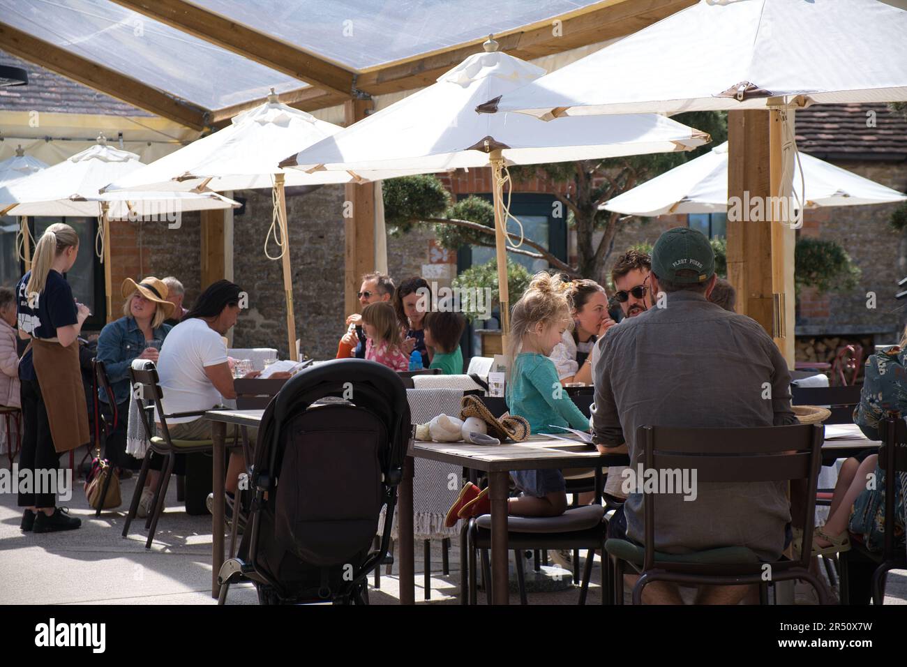 Families enjoying a coffee in the Roth Bar & Grill at the Hauser ...