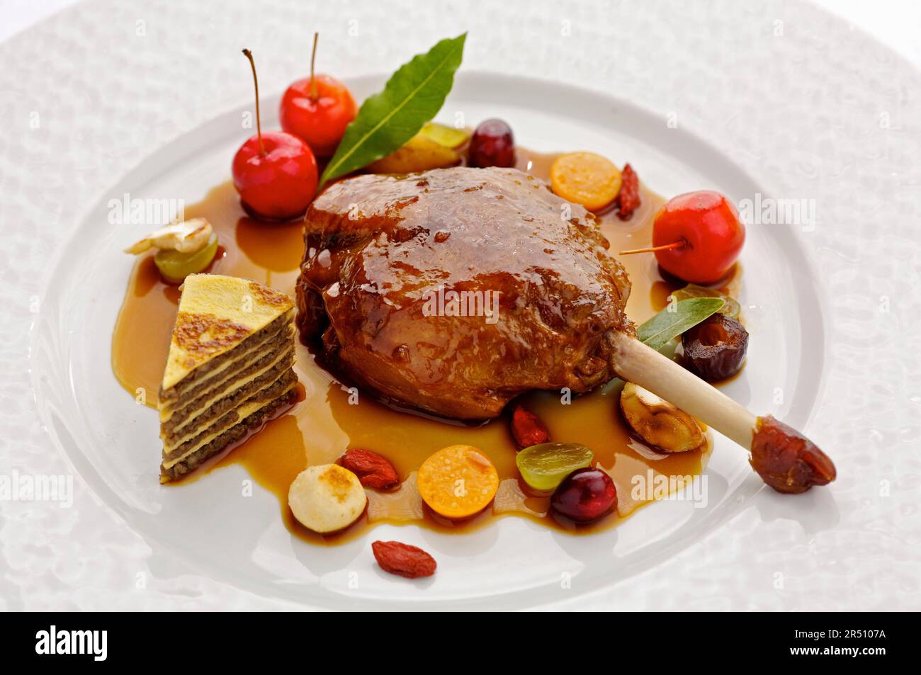 Goose confit with autumnal fruits Stock Photo - Alamy