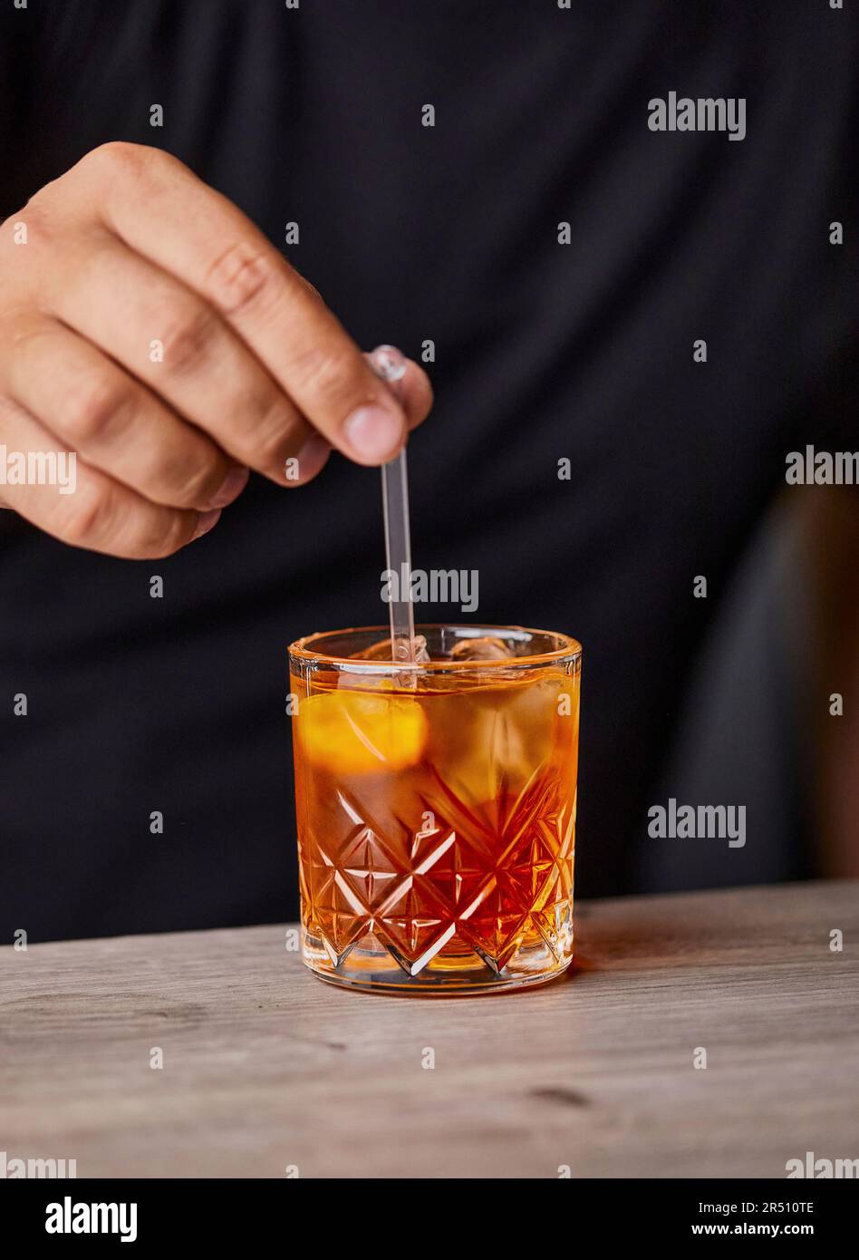 Stirring an Old Fashioned Cocktail Stock Photo - Alamy