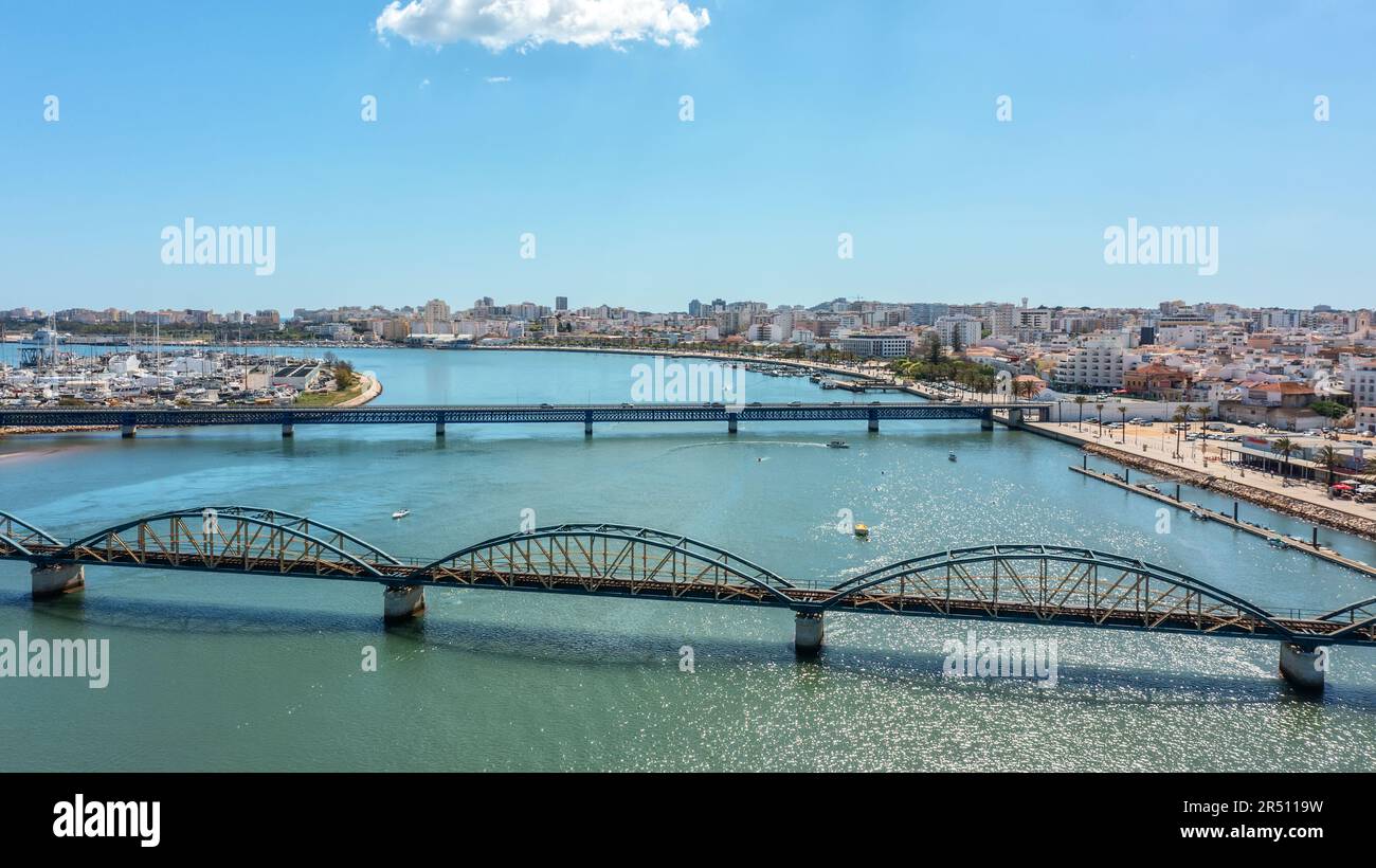 Portuguese bridges over the river Arade overlooking the city of ...