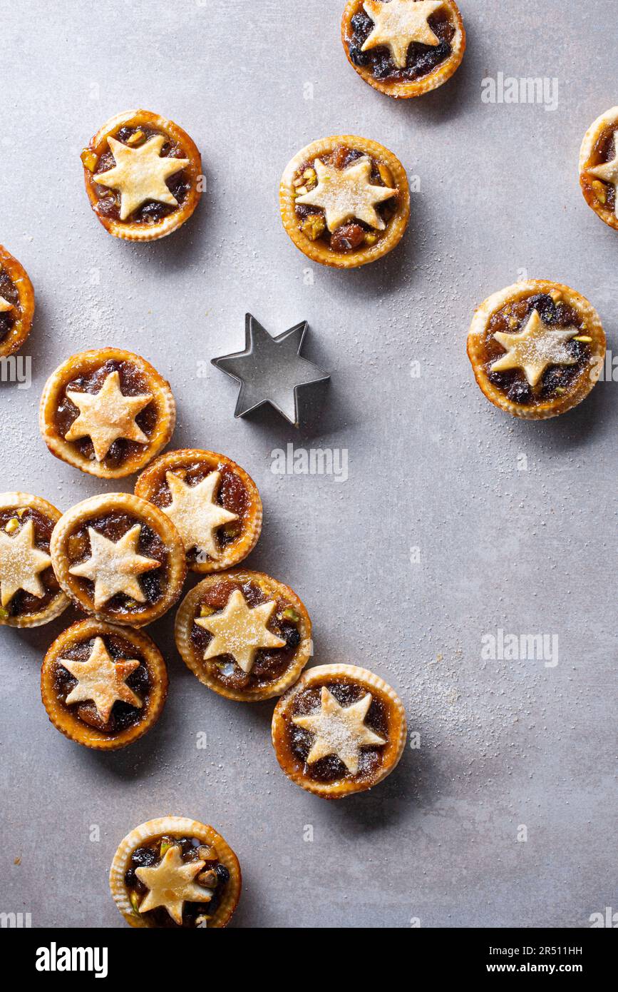 Mince pies on a grey background Stock Photo - Alamy
