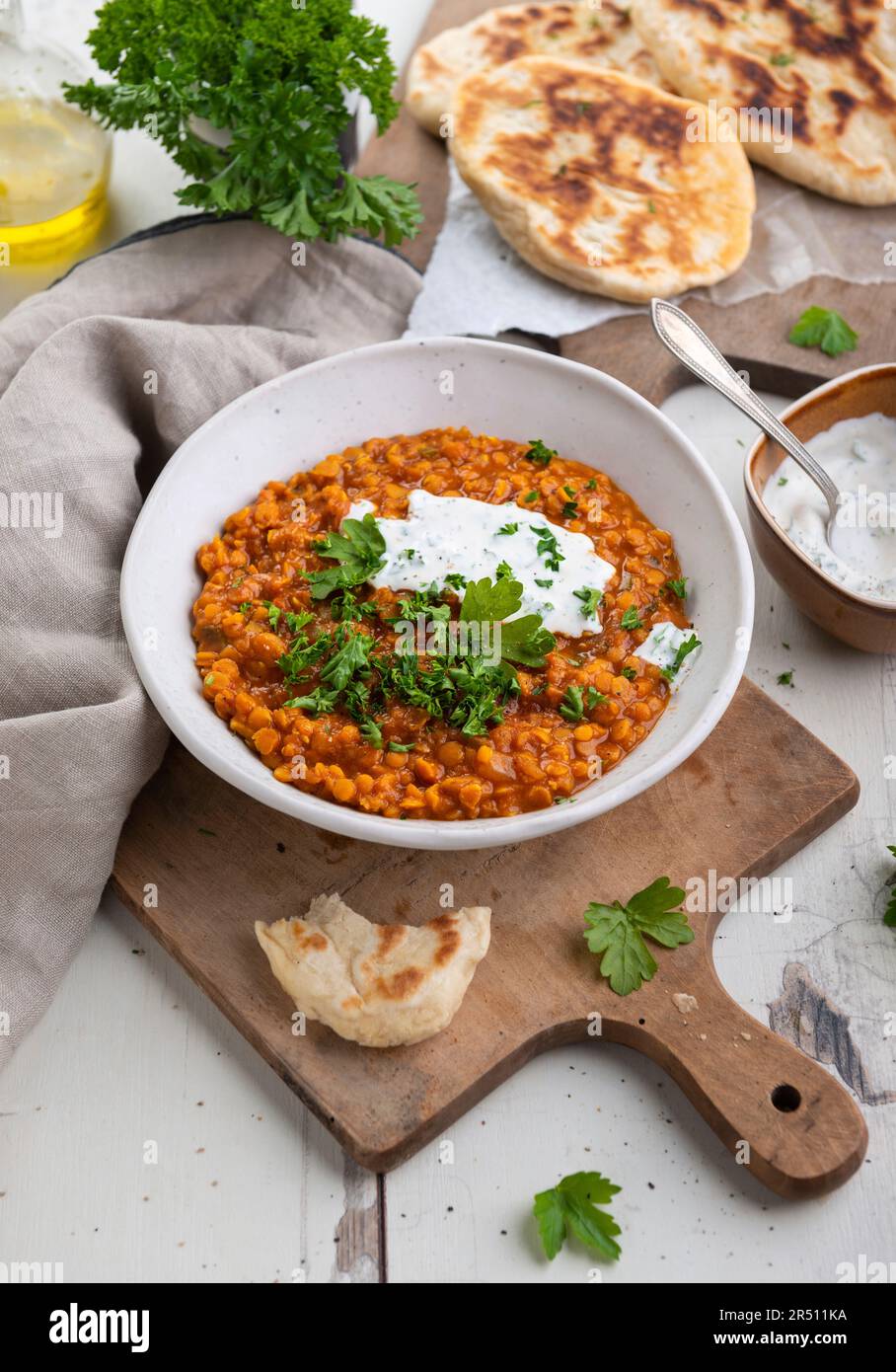Vegan Red Lentil Dal with Herbal Coconut Cream and Naan Bread (India ...