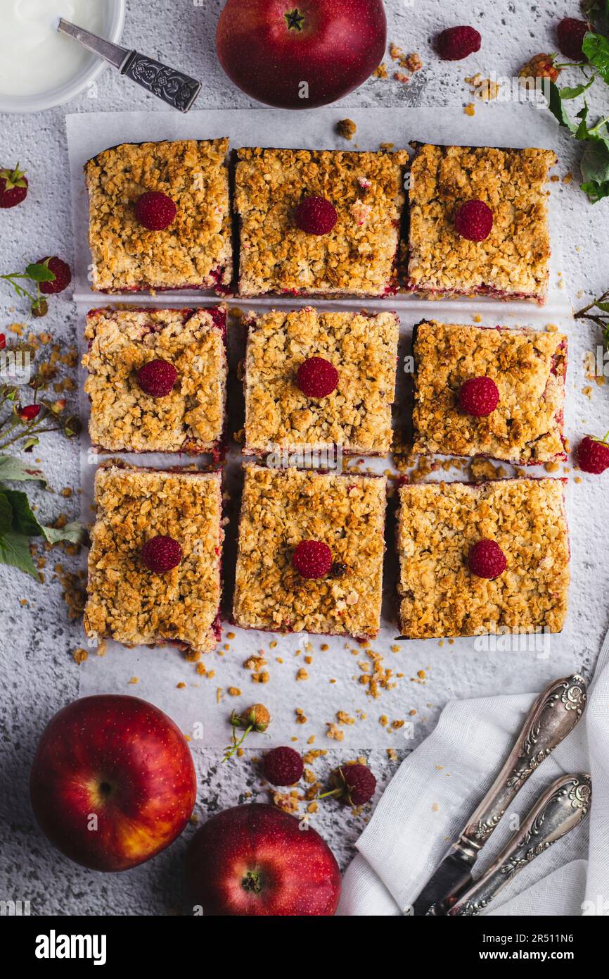 Apple and raspberry cake with crumble Stock Photo - Alamy