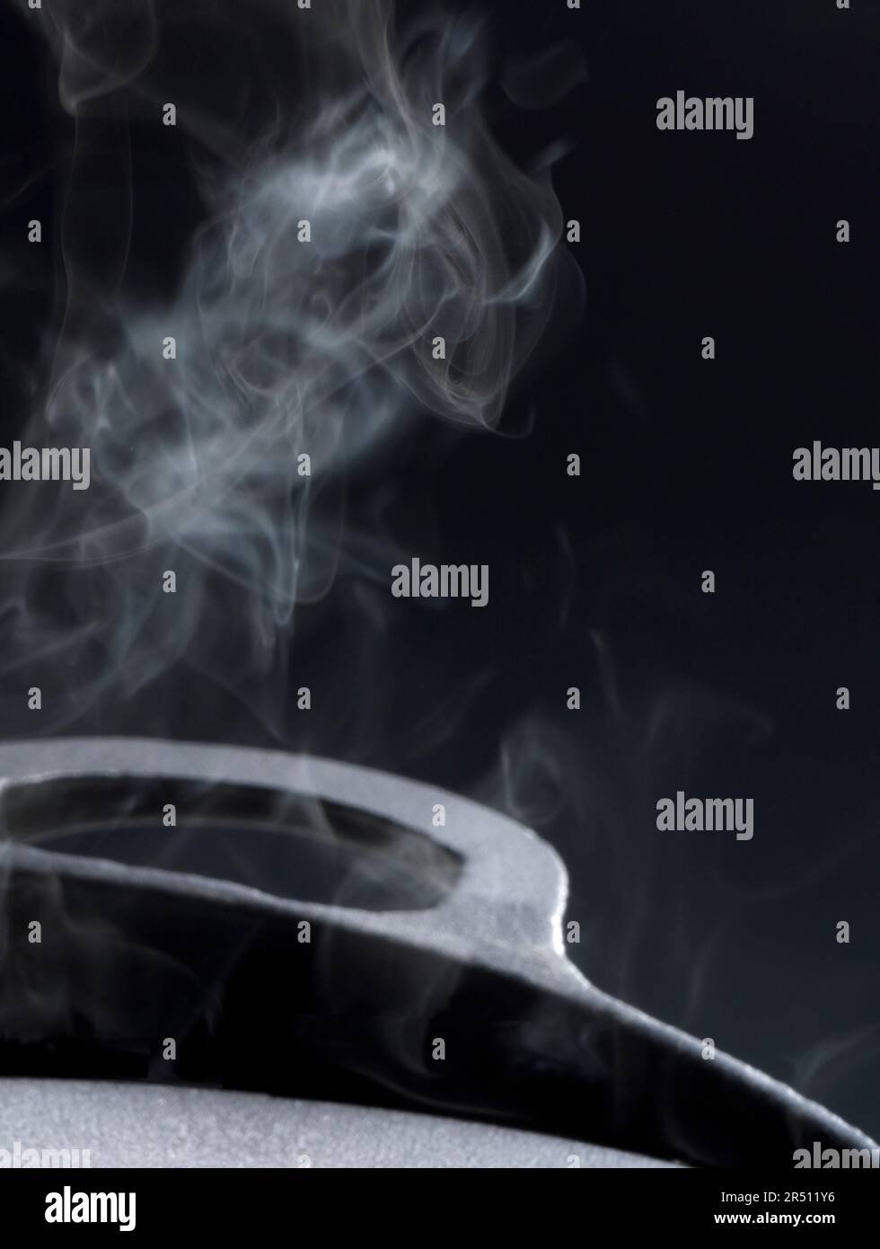 Steam over saucepan Stock Photo - Alamy