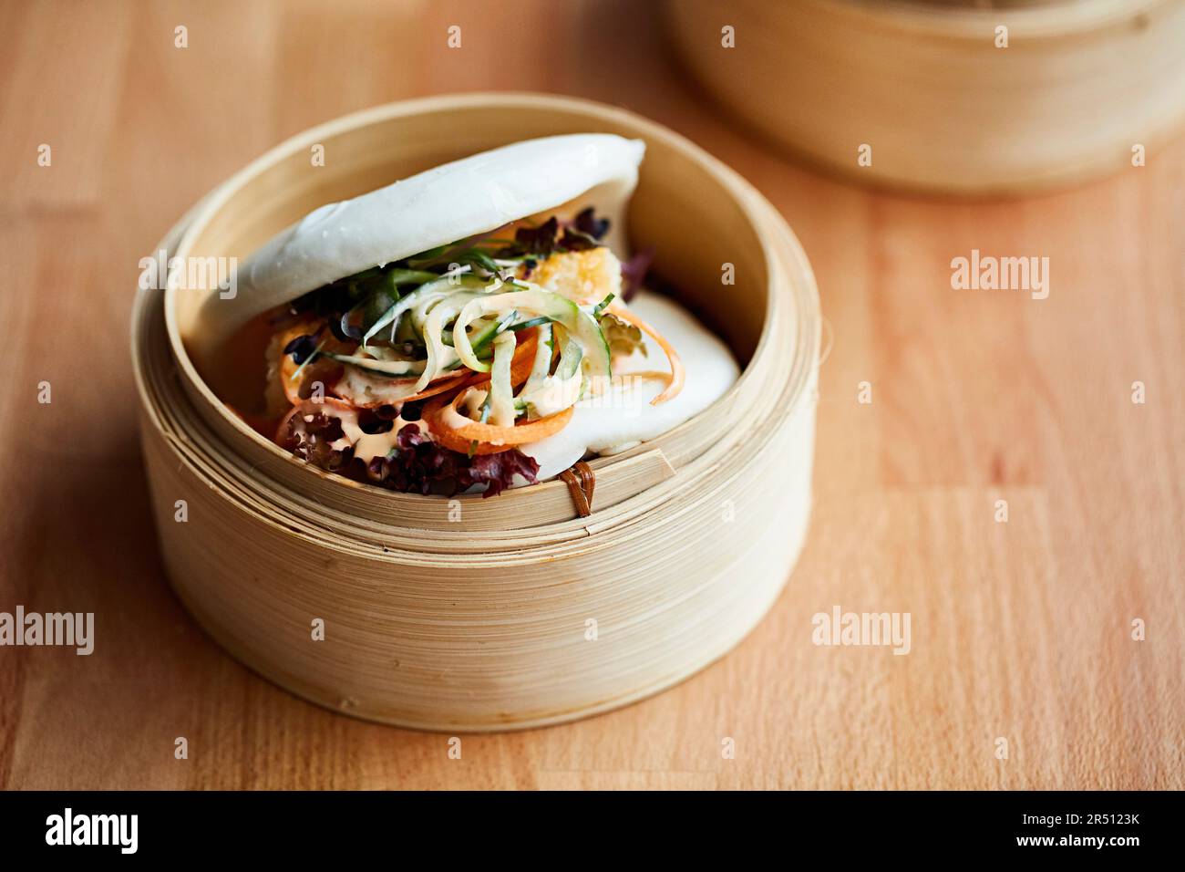Bao bun in a steamer basket (Asia Stock Photo - Alamy
