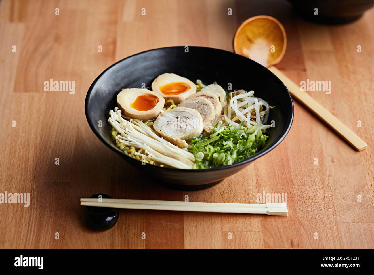 Pork ramen with egg and enoki mushrooms (Japan Stock Photo - Alamy